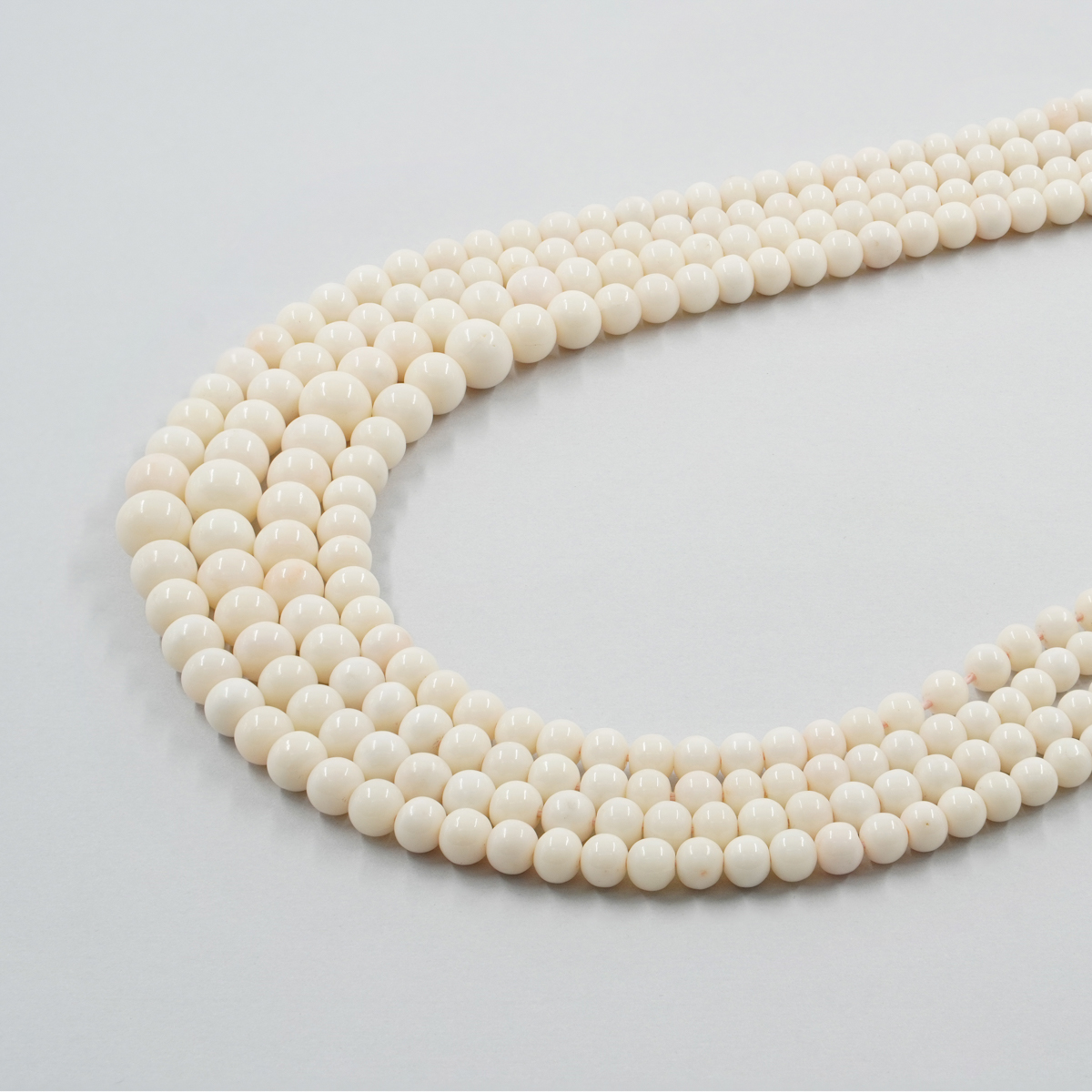 White Coral strands gradation button shape from 4mm to 10mm - Coral ...